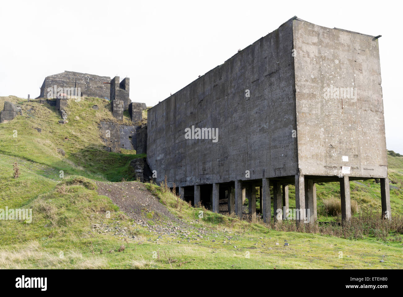 Concrete ruins, remains of stone quarry, loading bay. Clee Hill ...