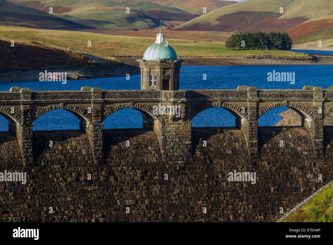 The Craig Goch dam and reservoir. Autumn fall tree colours Stock Photo ...