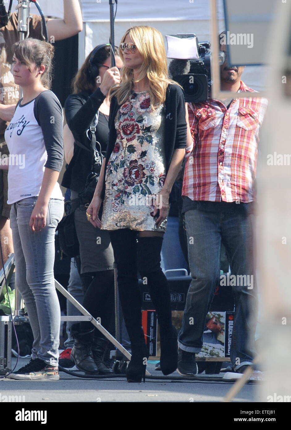 Super model Heidi Klum directs cast members and models to their ...