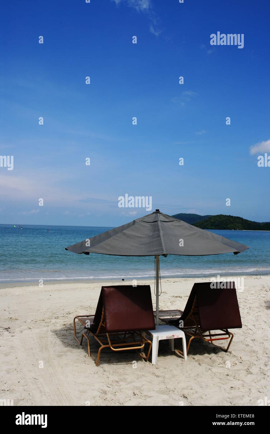 Two recliner chair at beach, Rest and relax at tropical beach Stock ...