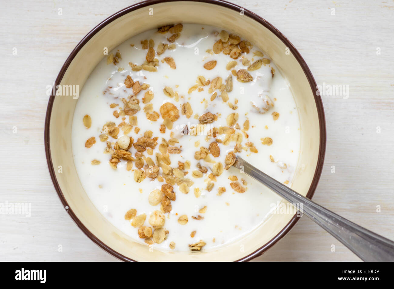 Muesli with yoghurt in a cup top view Stock Photo - Alamy