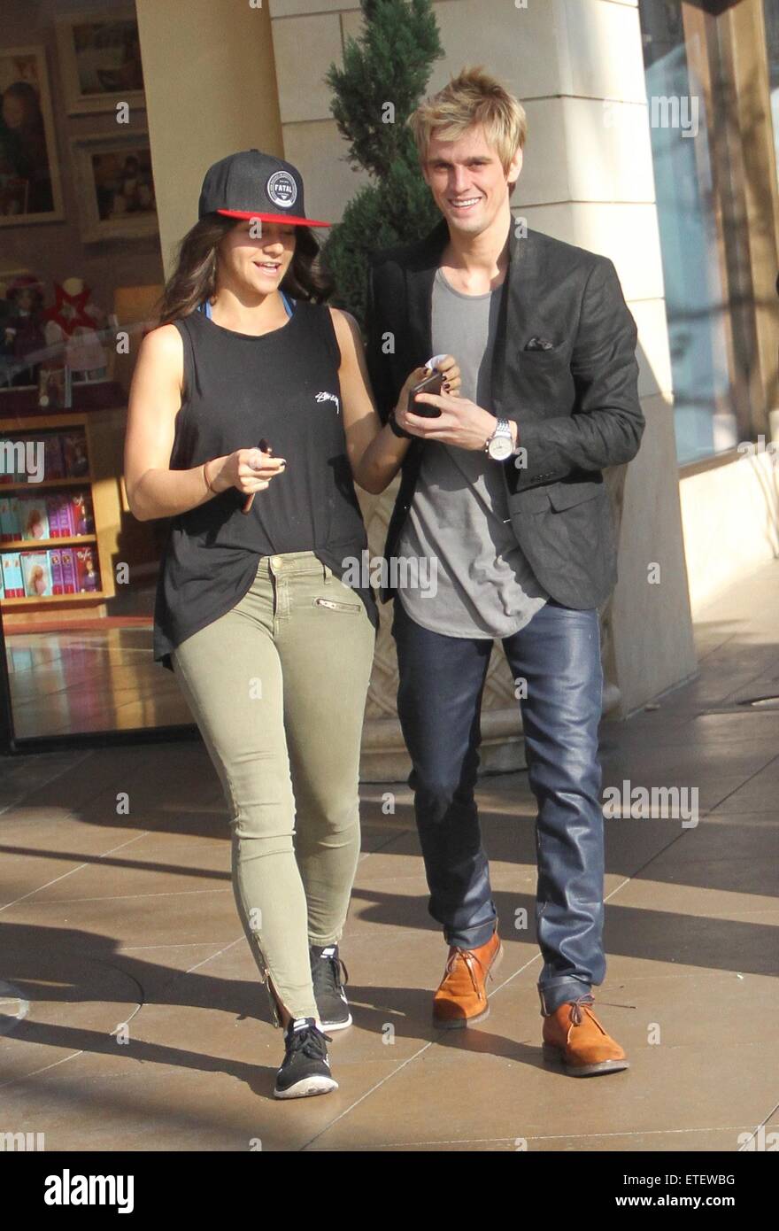 Aaron Carter goes shopping at The Grove with a female companion ...
