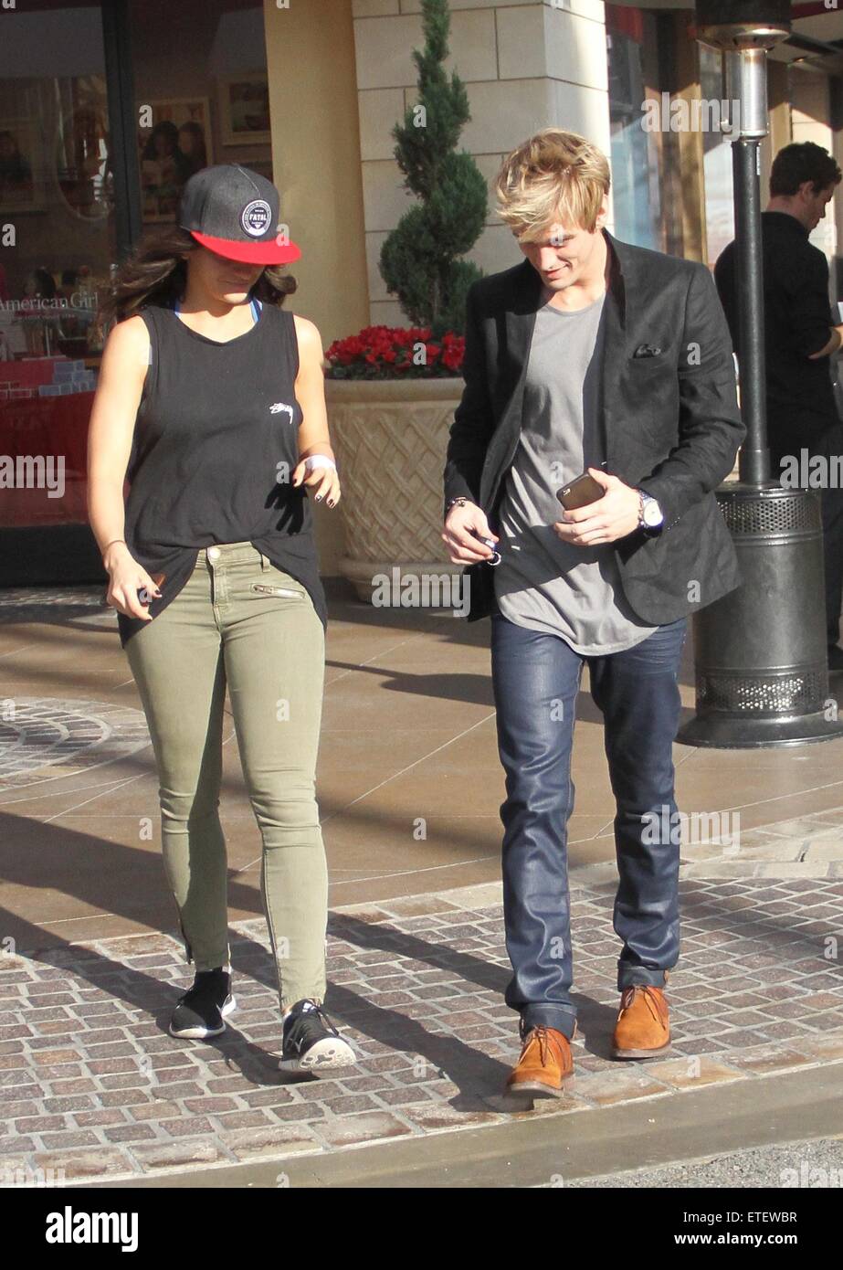 Aaron Carter goes shopping at The Grove with a female companion ...