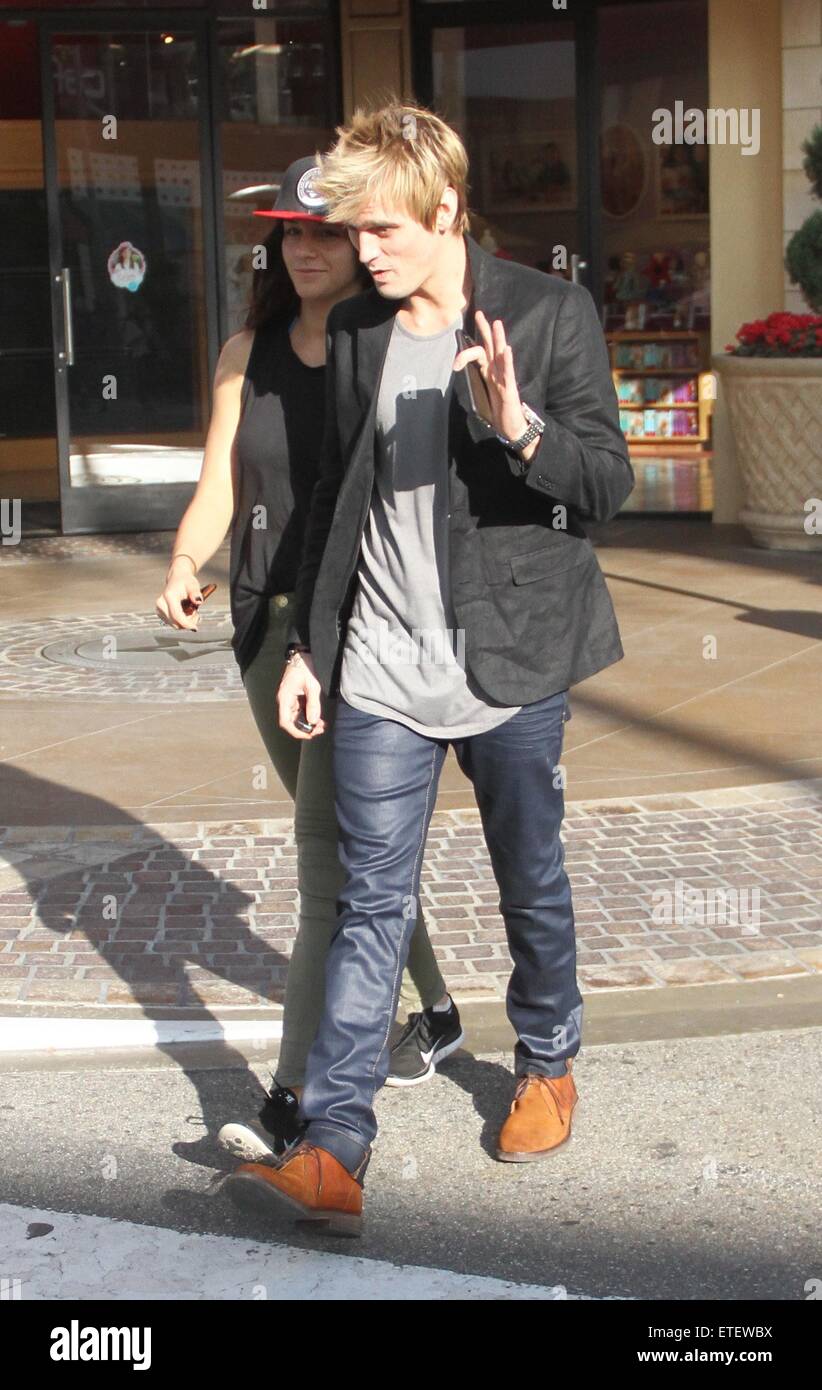 Aaron Carter goes shopping at The Grove with a female companion ...
