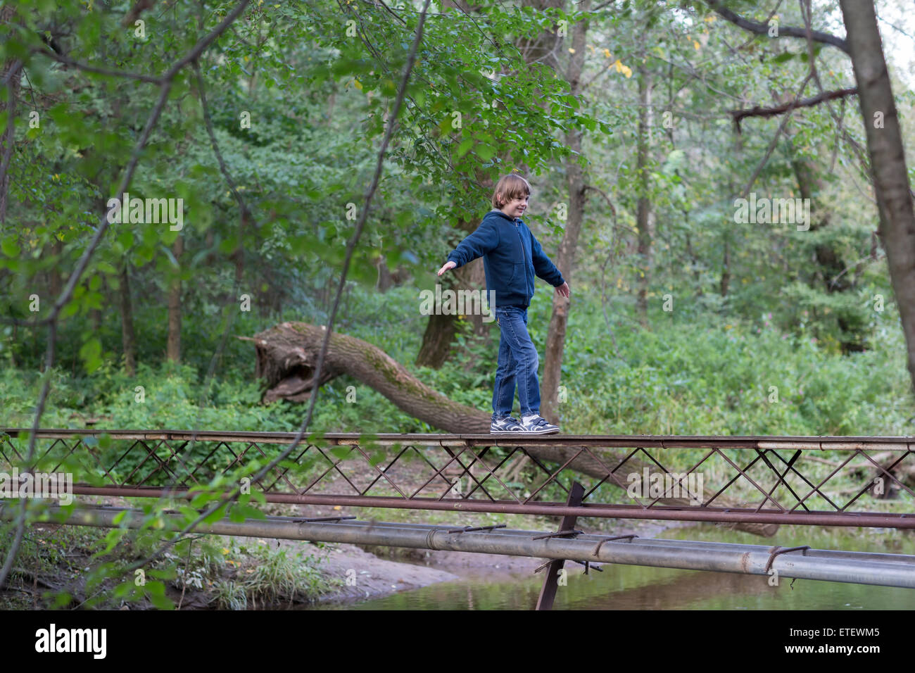 Little boy bridge stream hi-res stock photography and images - Alamy