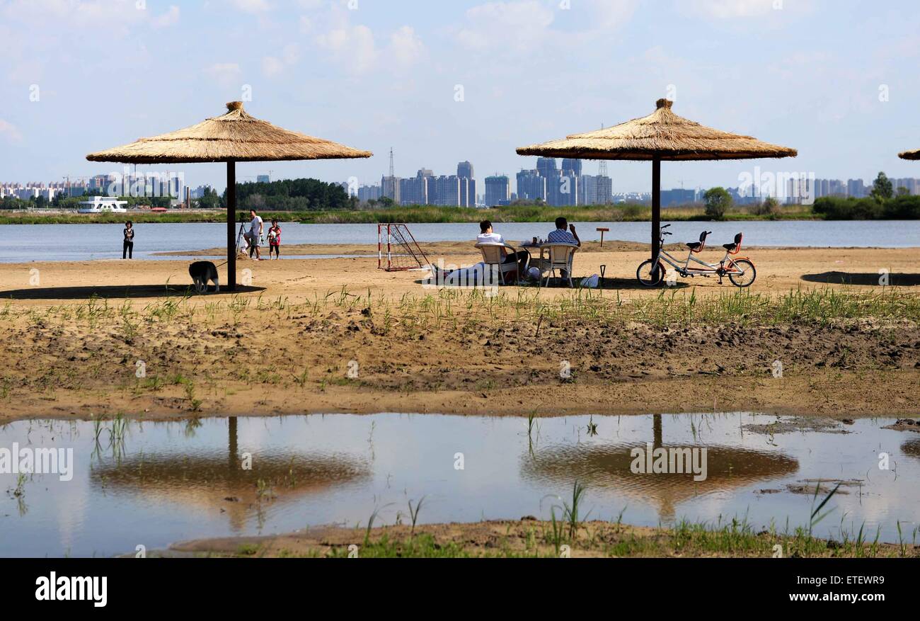 Harbin, China's Heilongjiang Province. 13th June, 2015. Tourists go ...
