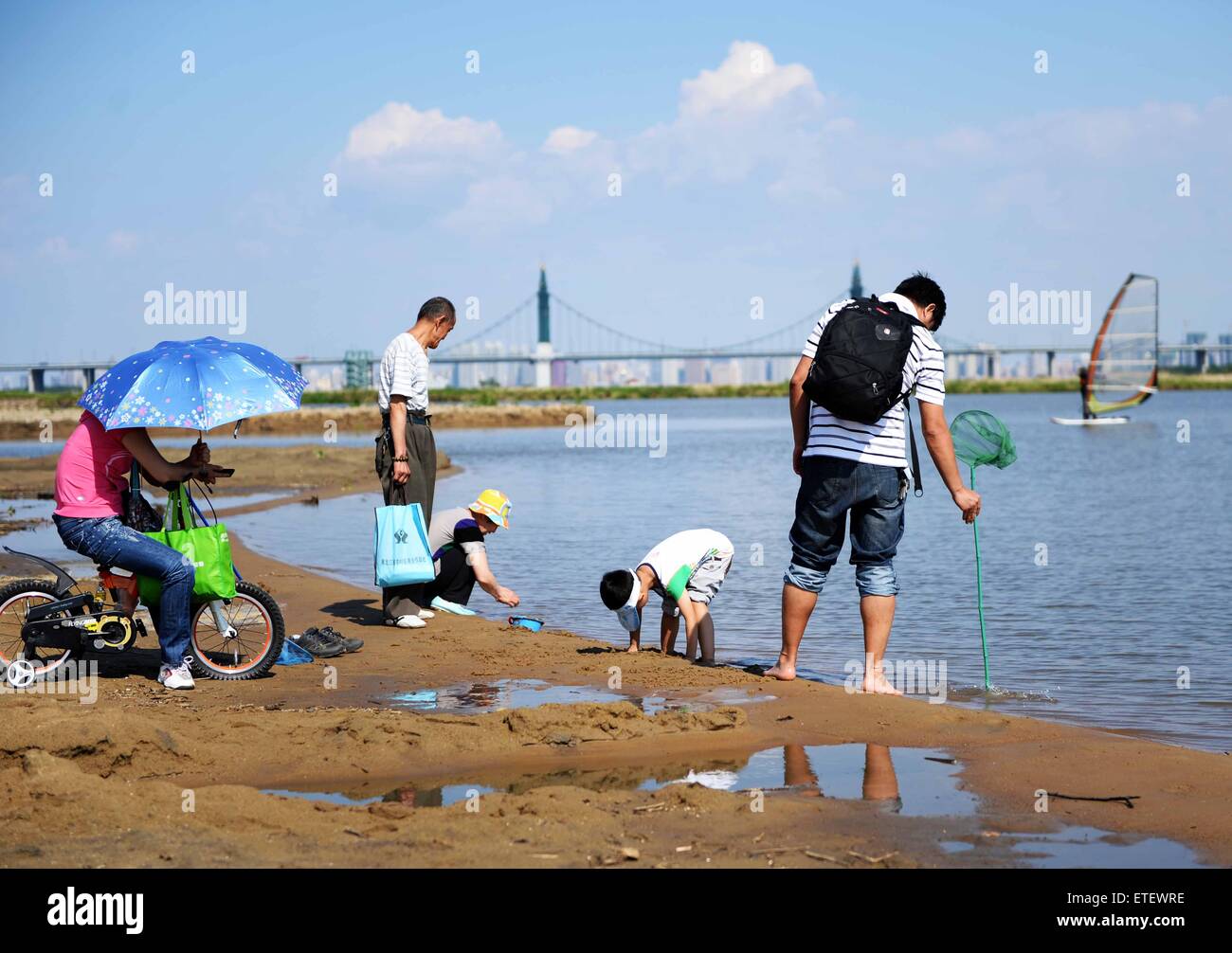 Harbin, China's Heilongjiang Province. 13th June, 2015. Tourists go ...