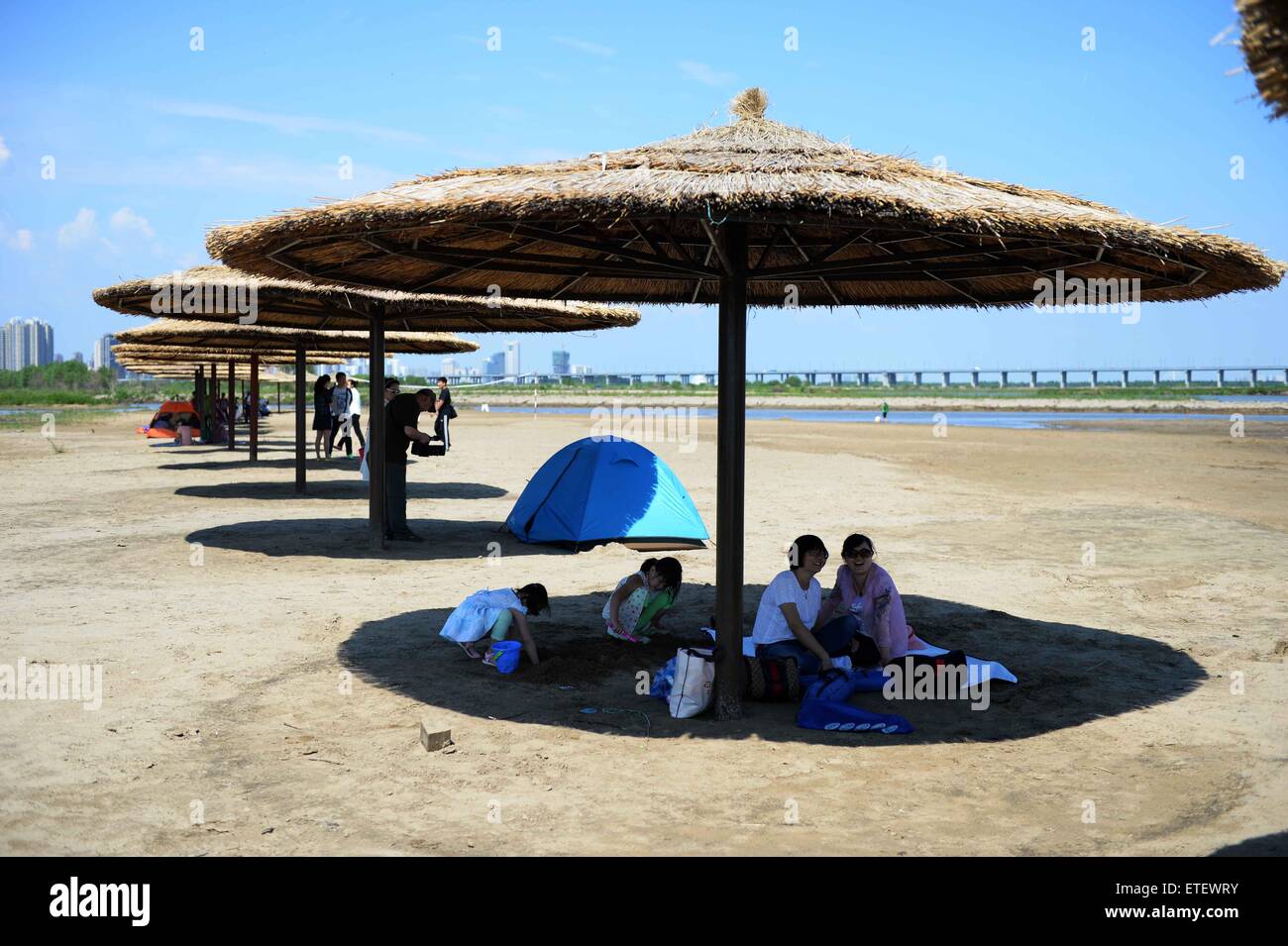 Harbin, China's Heilongjiang Province. 13th June, 2015. Tourists go ...