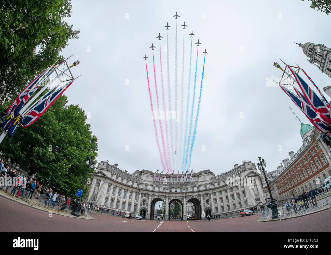 London, UK. 13th June, 2015. Flypast by the RAF Red Arrows over ...