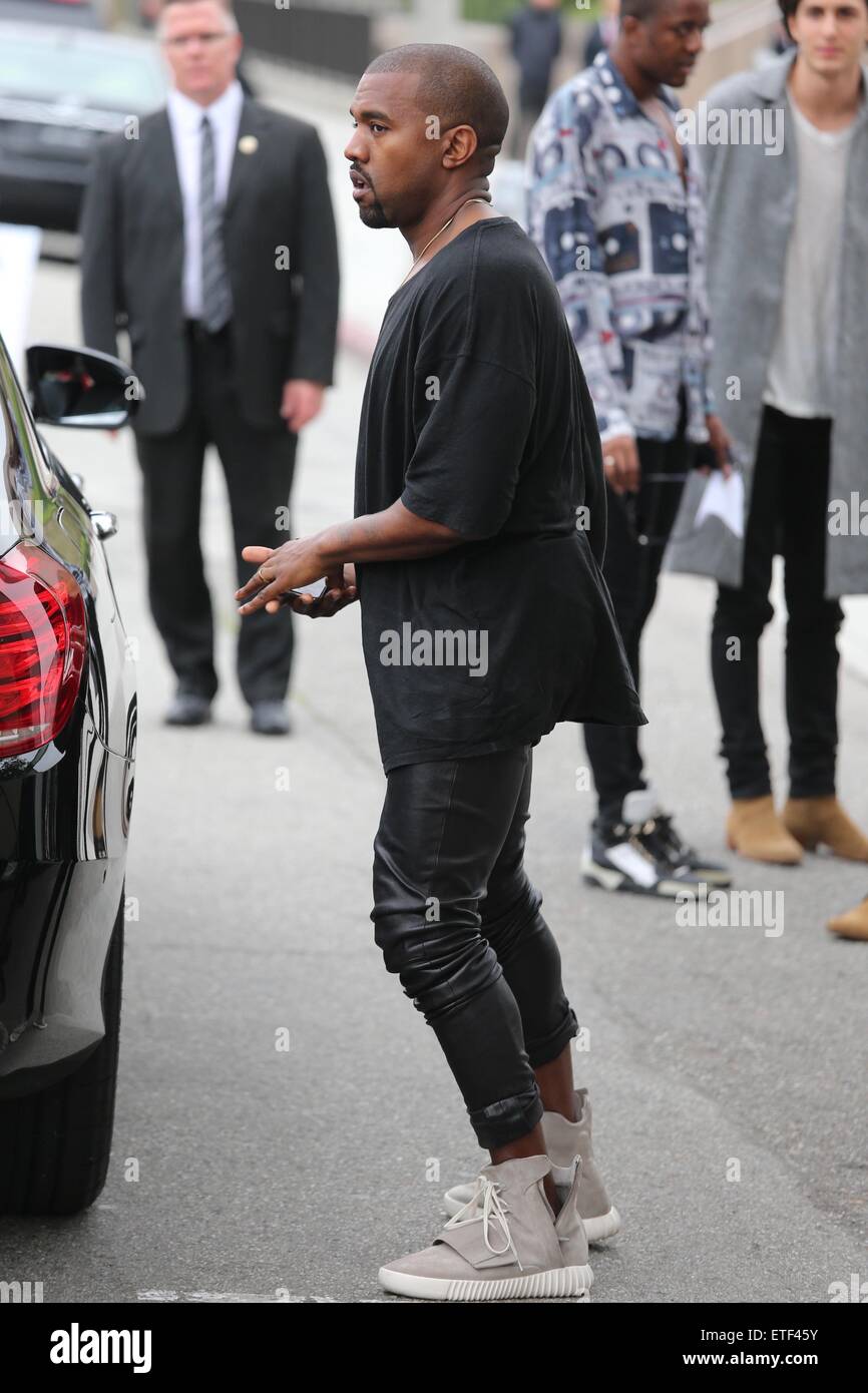 Kim Kardashian and Kanye West arrive at the Roc-Nation Pre-Grammy party ...