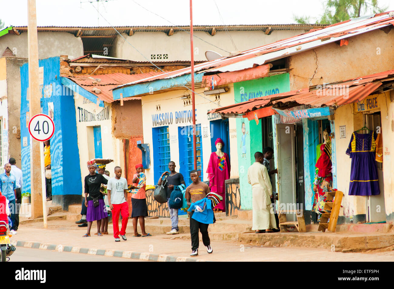 Main street scene with brightly painted shops, Nyamirambo, Kigali ...