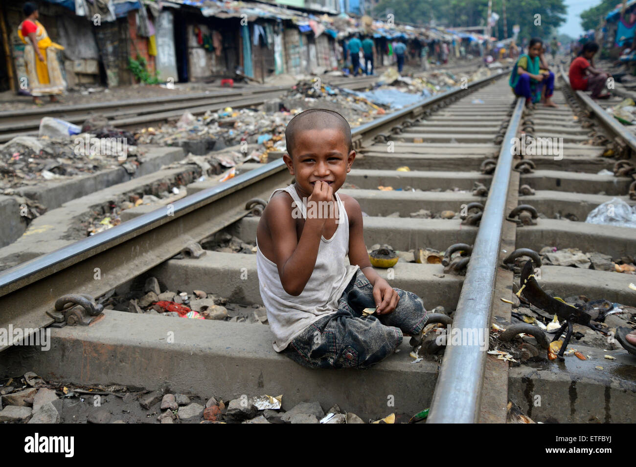 Dhaka, Bangladesh. 13th June, 2015. Slum Children are sitting on the ...