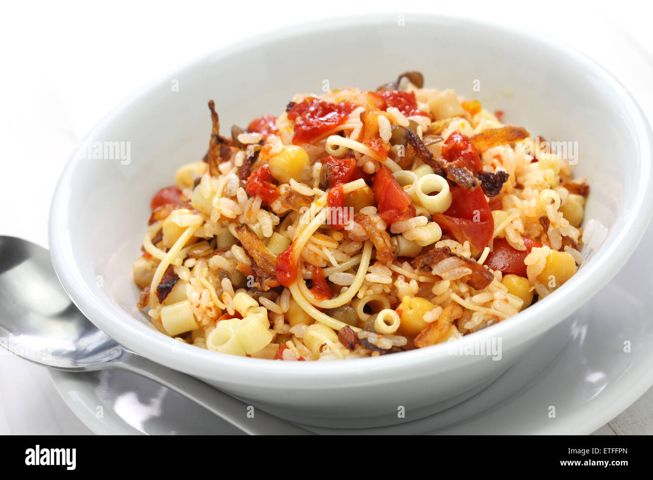 kushari, koshari, egyptian food isolated on white wooden background ...