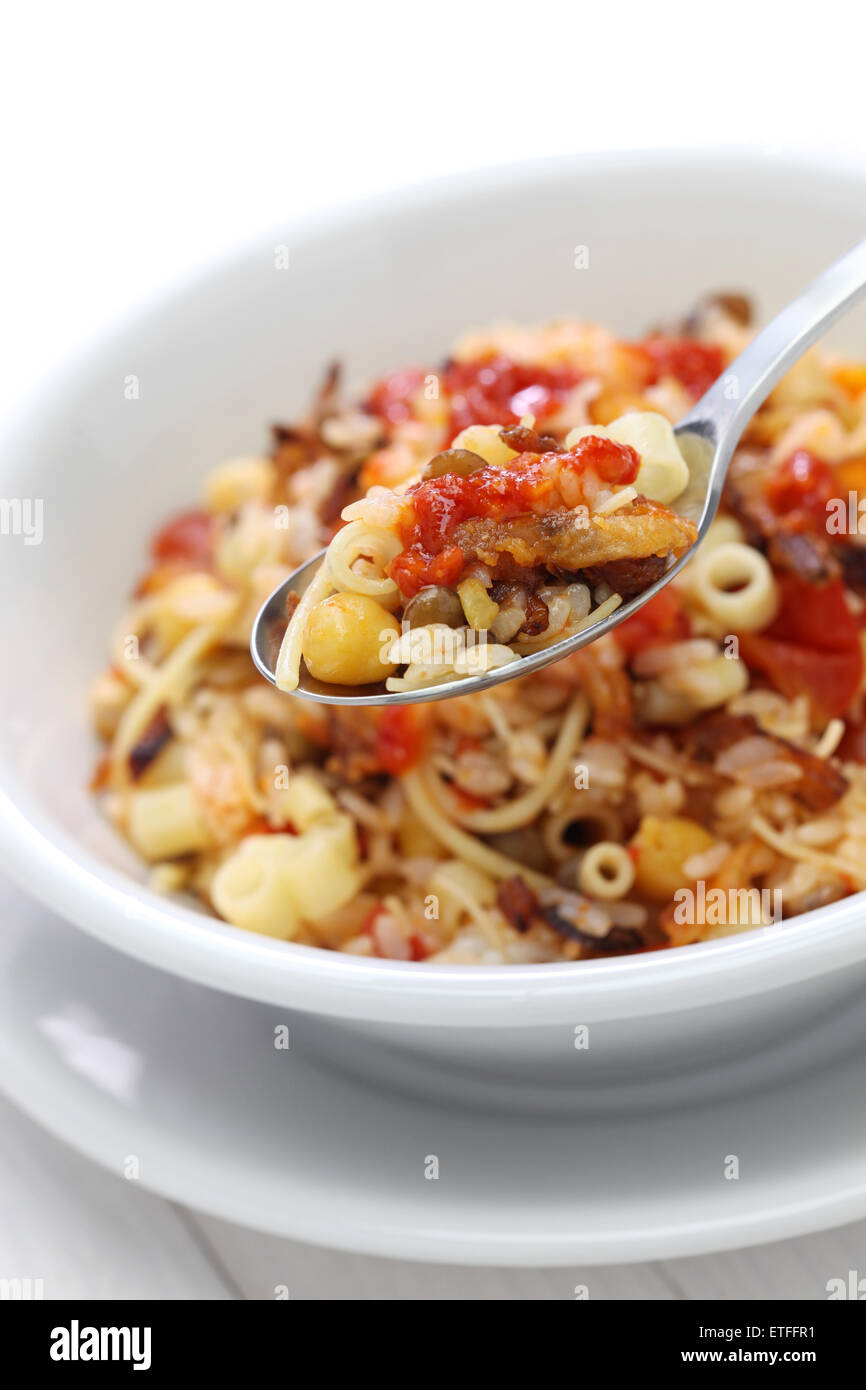 kushari, koshari, egyptian food isolated on white wooden background ...