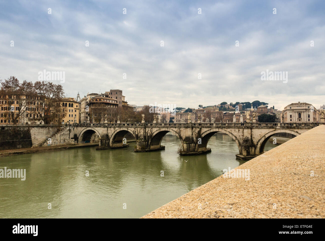 Bridge over the Tiber river in the center of Rome Stock Photo - Alamy