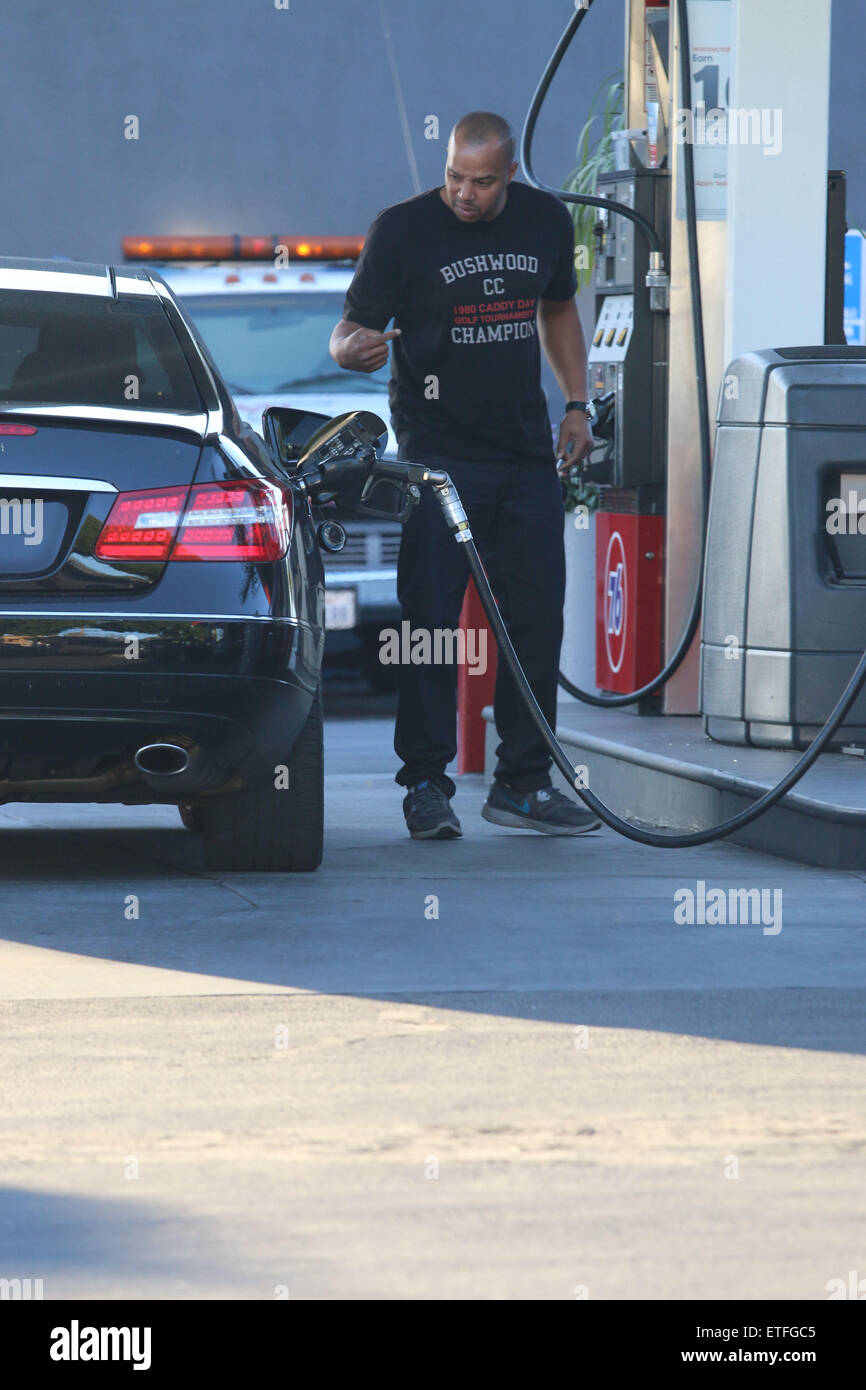 Scrubs actor Donald Faison pumping gas in his Mercedes in West ...