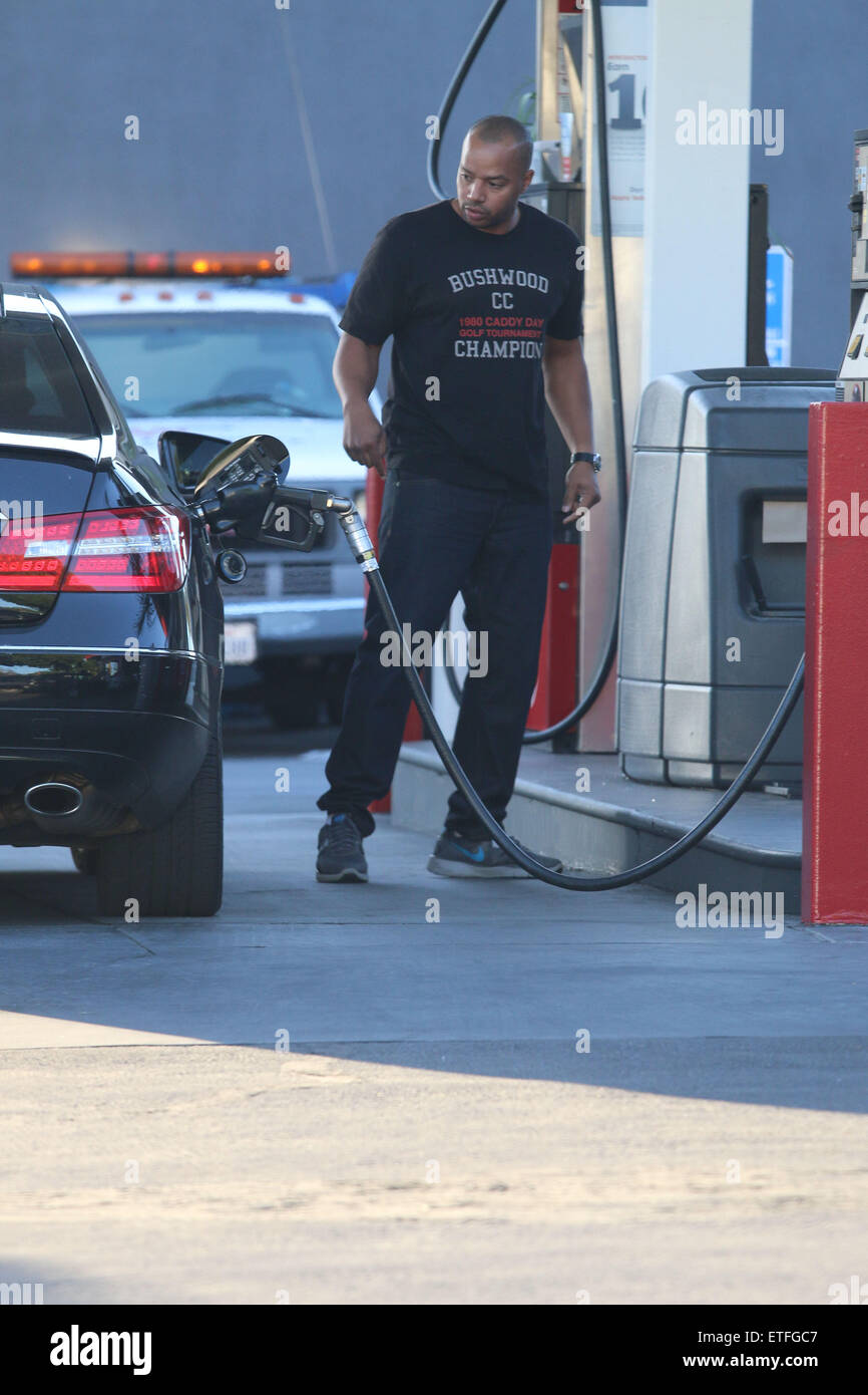 Scrubs actor Donald Faison pumping gas in his Mercedes in West ...