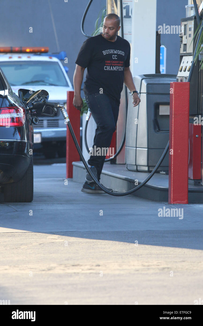 Scrubs actor Donald Faison pumping gas in his Mercedes in West ...