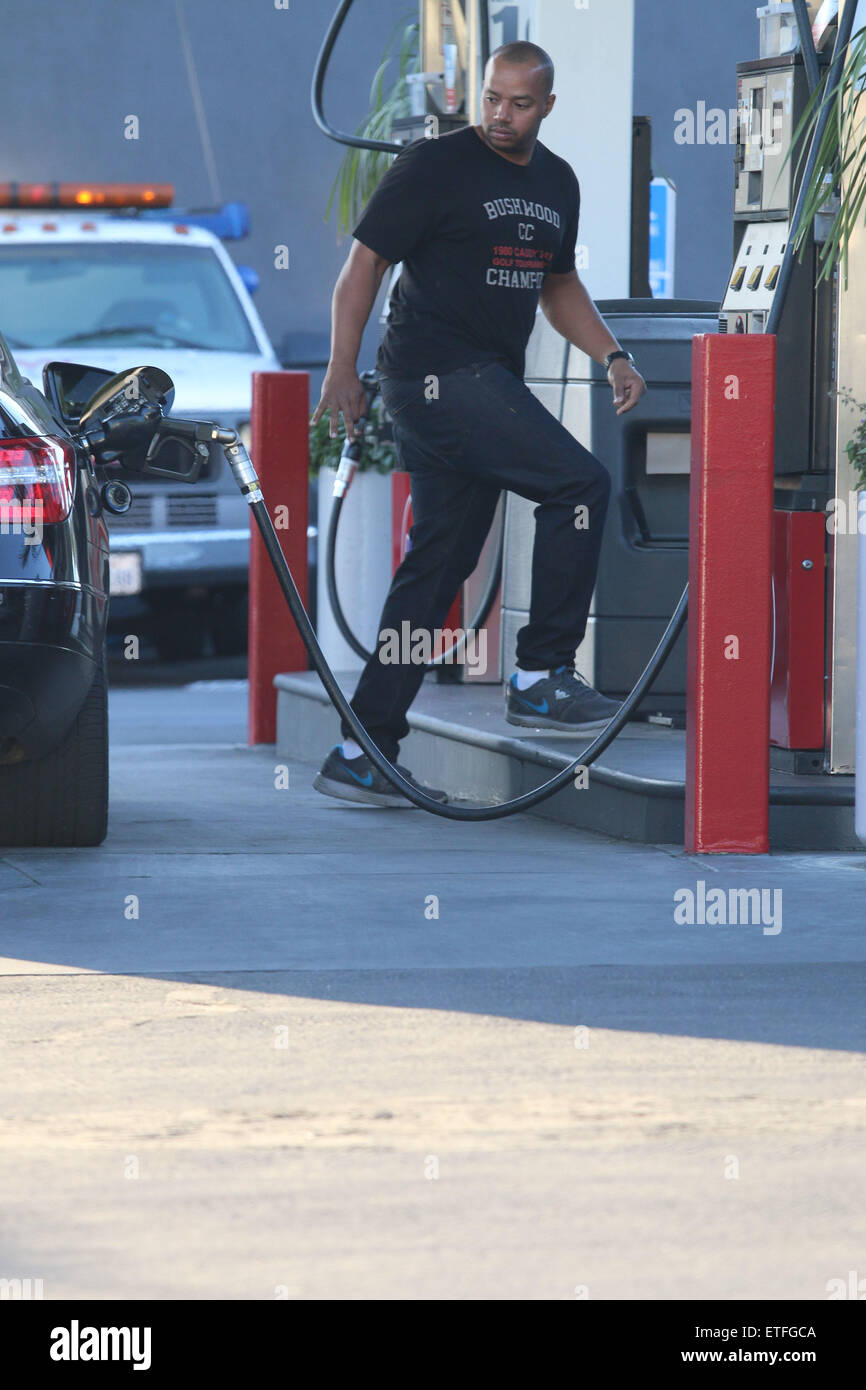 Scrubs actor Donald Faison pumping gas in his Mercedes in West ...