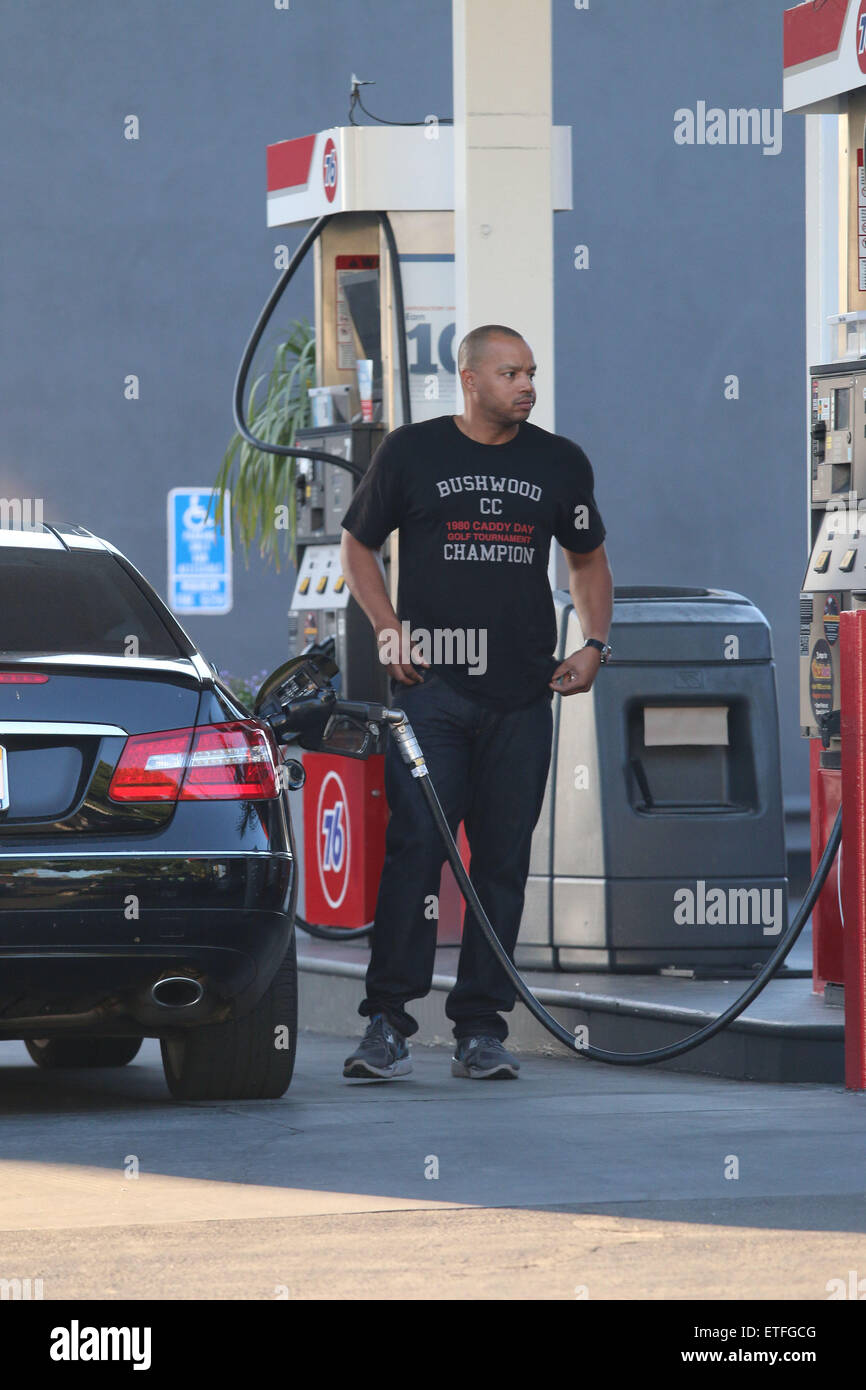 Scrubs actor Donald Faison pumping gas in his Mercedes in West ...