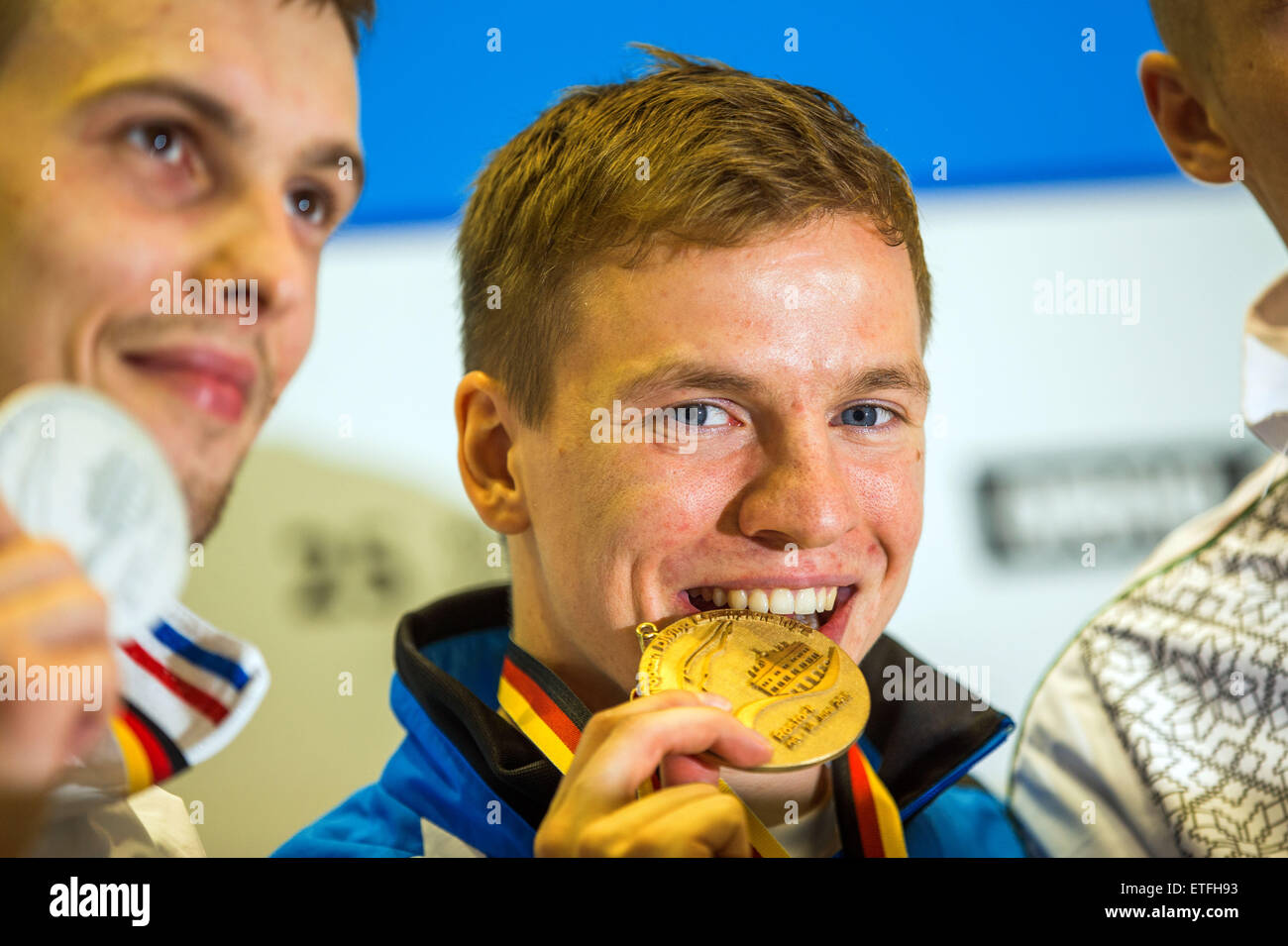 German diver Martin Wolfram with his gold medal after winning the men's ...