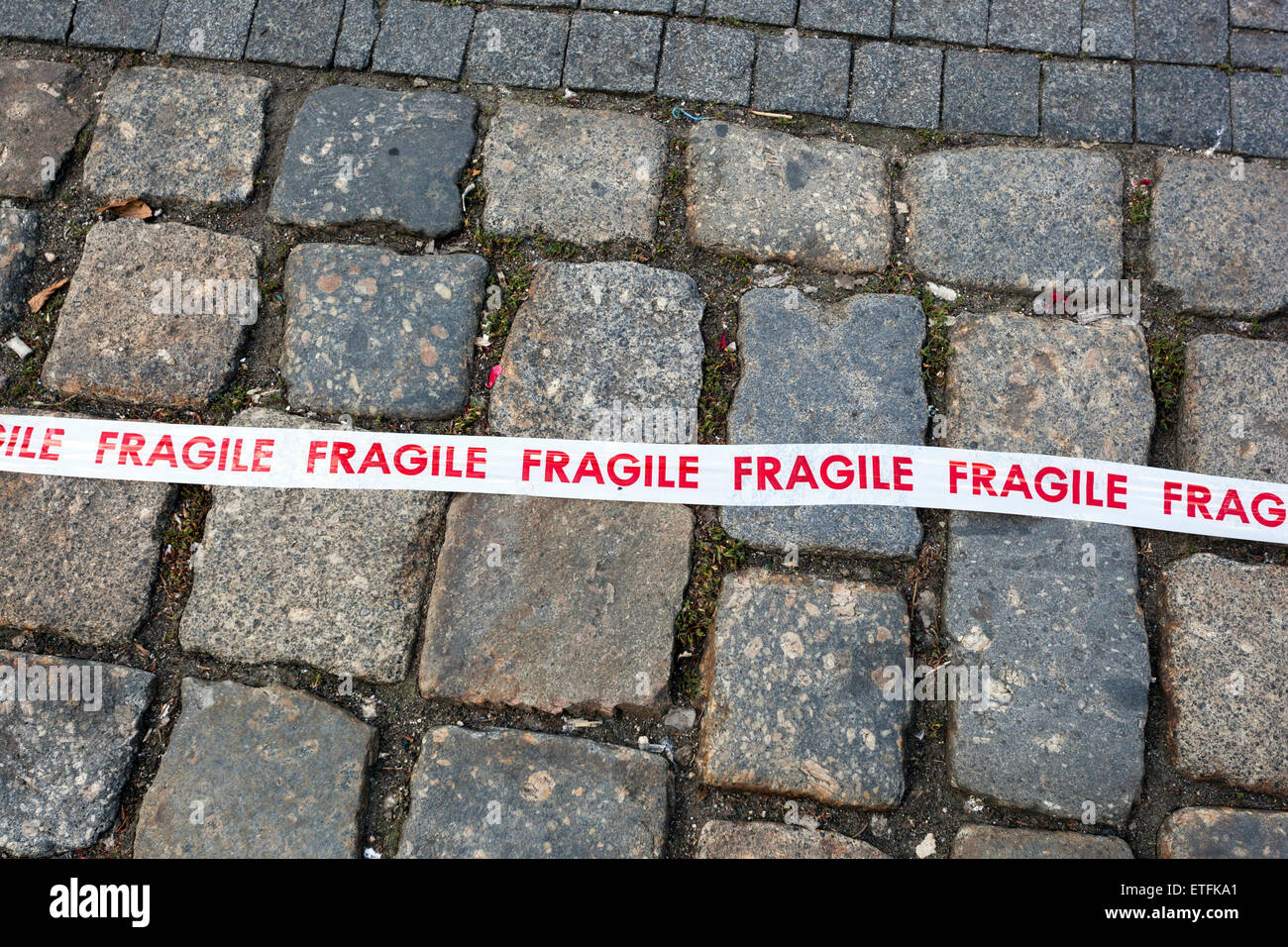 A fragile line on the pavement Stock Photo - Alamy