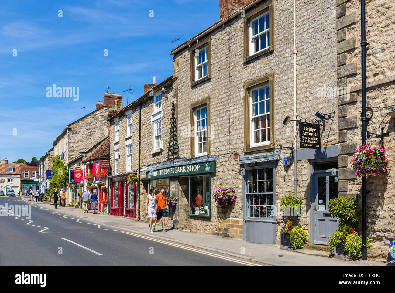 Shops on Bridge Street in the market town of Helmsley, North Yorkshire ...