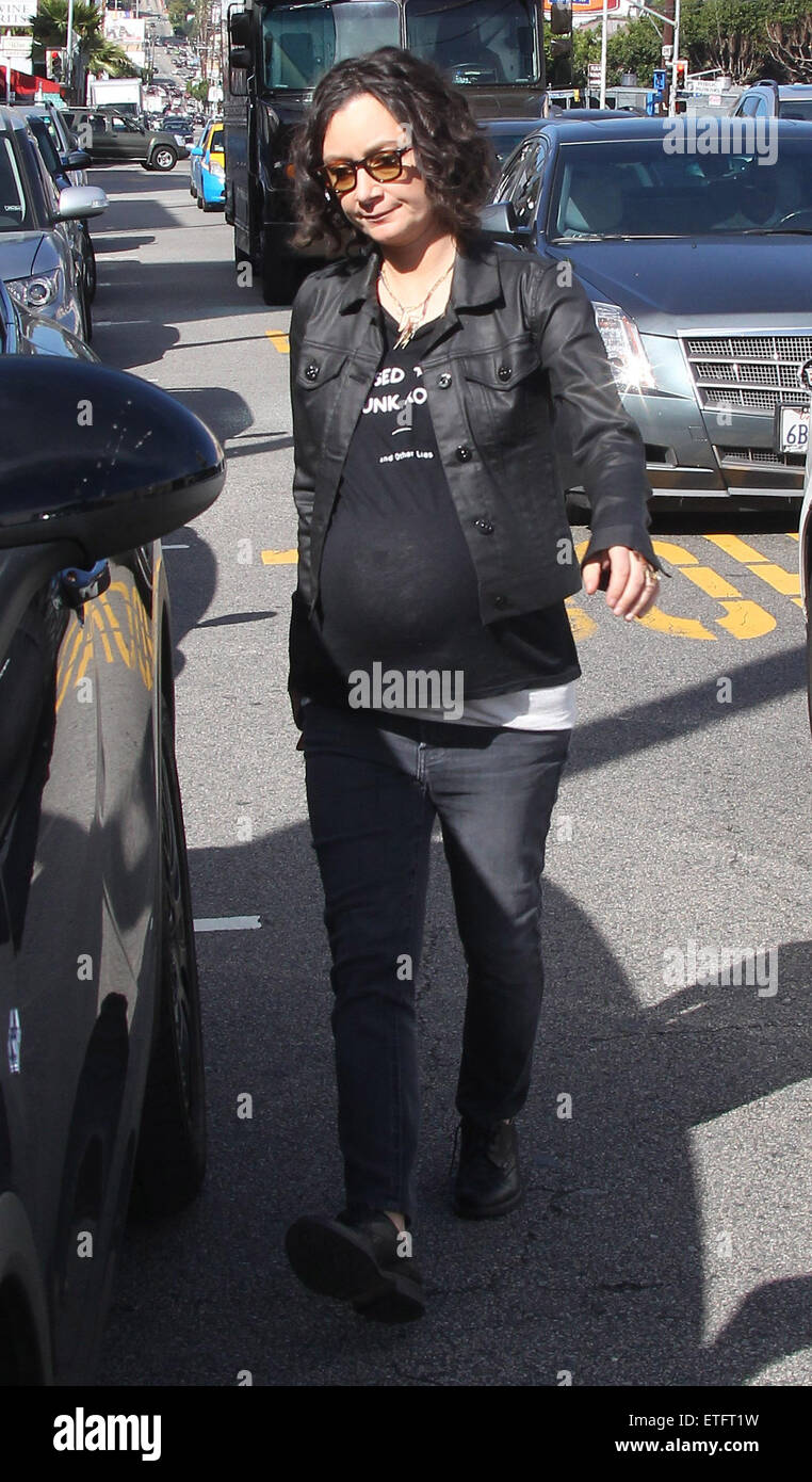 Heavily pregnant Sara Gilbert taking some long strides as she walks ...