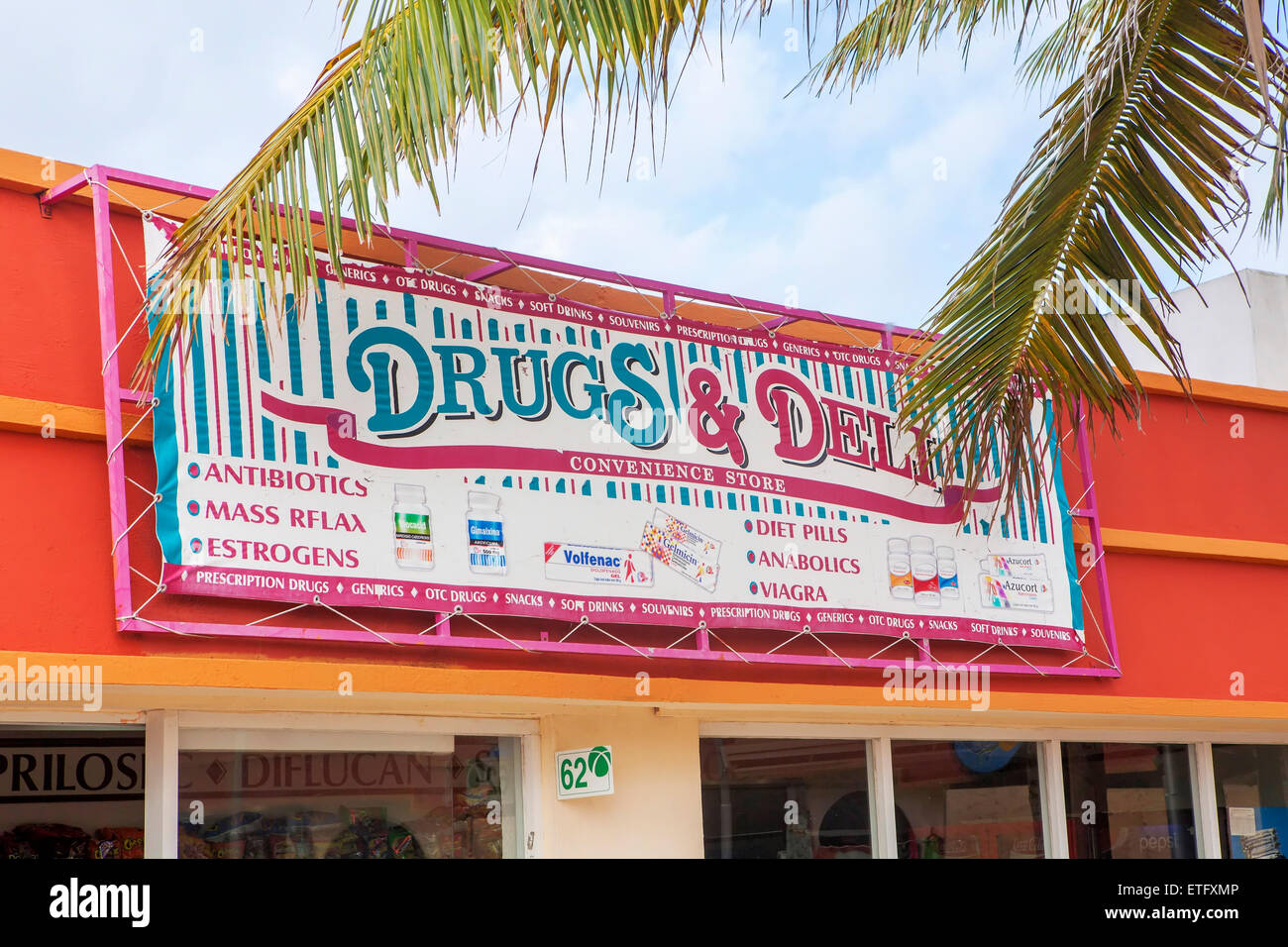 A large sign over a store in Cozumel, Mexico advertises drugs, food and ...