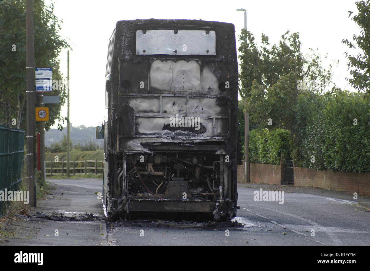 A burnt-out double-decker bus Stock Photo - Alamy