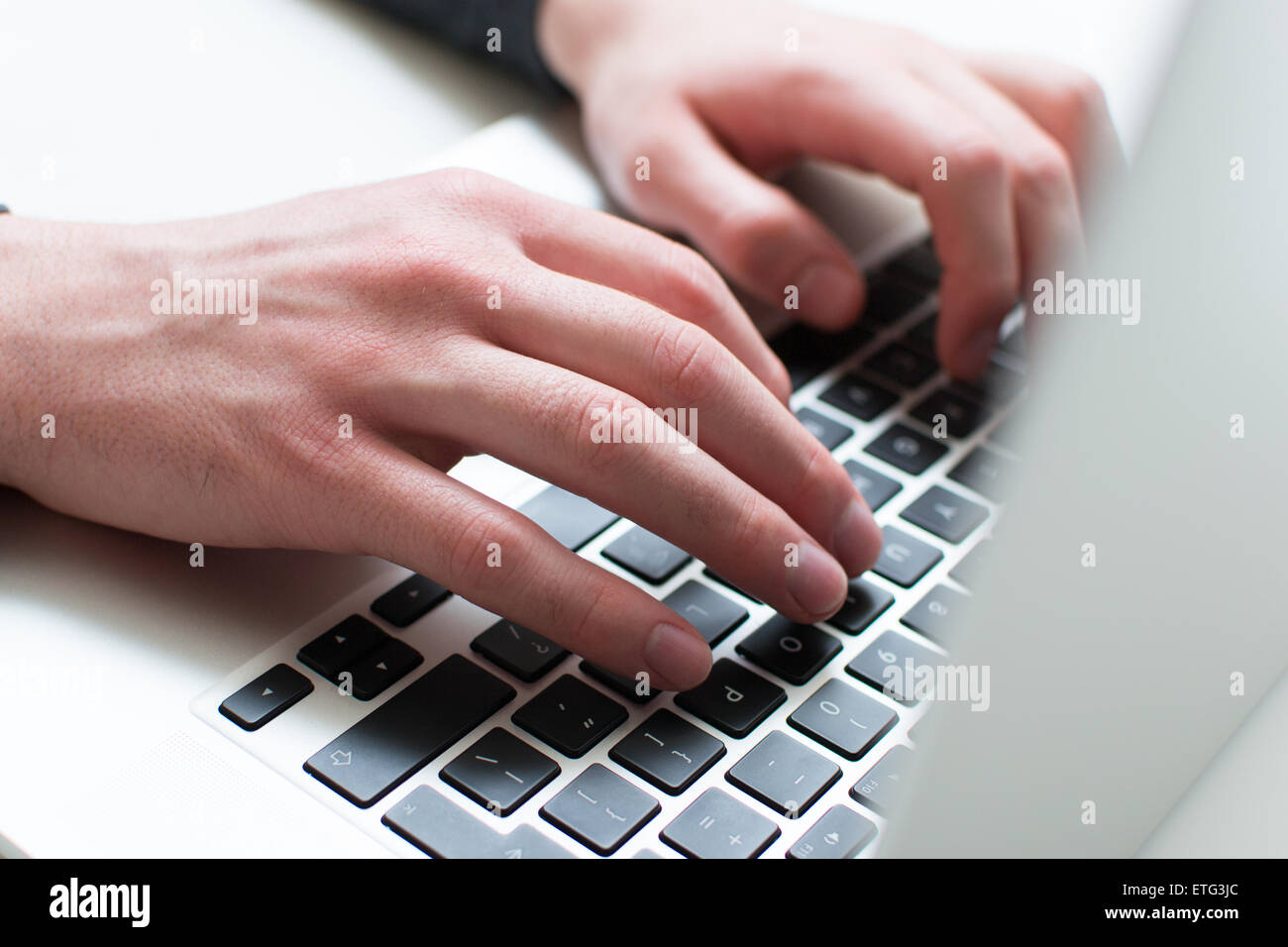Adult male typing on keyboard hi-res stock photography and images - Alamy