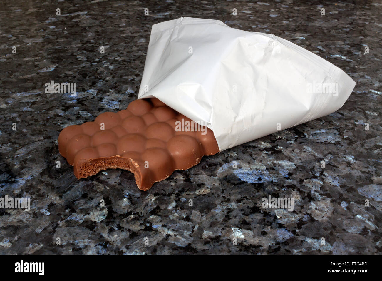 Bitten chocolate bar hi-res stock photography and images - Alamy