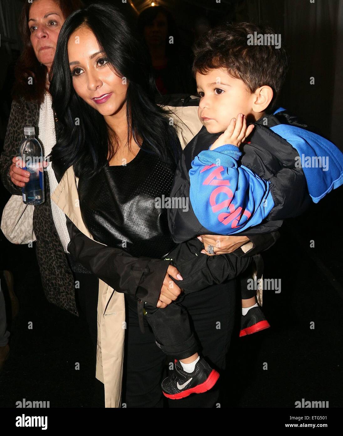 Nicole Polizzi with her son, Lorenzo during Mercedes-Benz Fashion Week ...