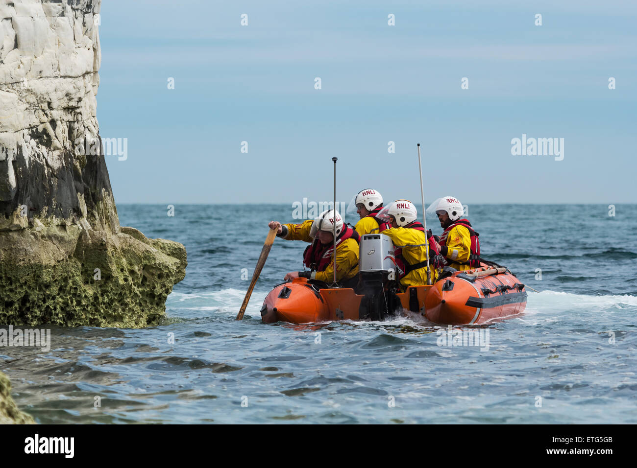 Lifeboat crew in their speedboat on sea during a search and rescue ...