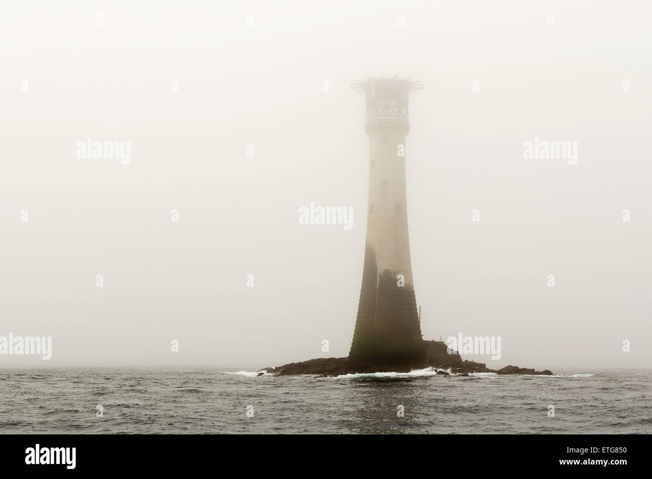 Wolf Rock Lighthouse on a foggy day Stock Photo - Alamy