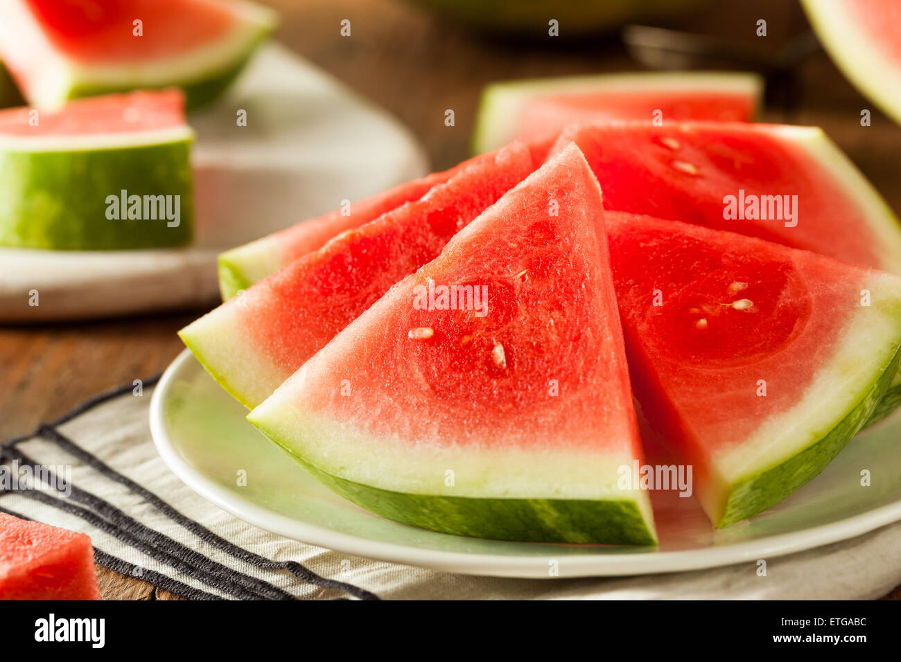 Organic Ripe Seedless Watermelon Cut into Wedges Stock Photo - Alamy