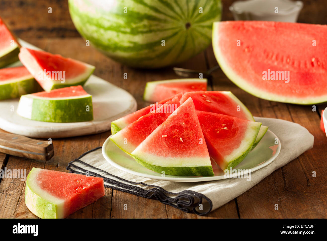 Organic Ripe Seedless Watermelon Cut into Wedges Stock Photo - Alamy