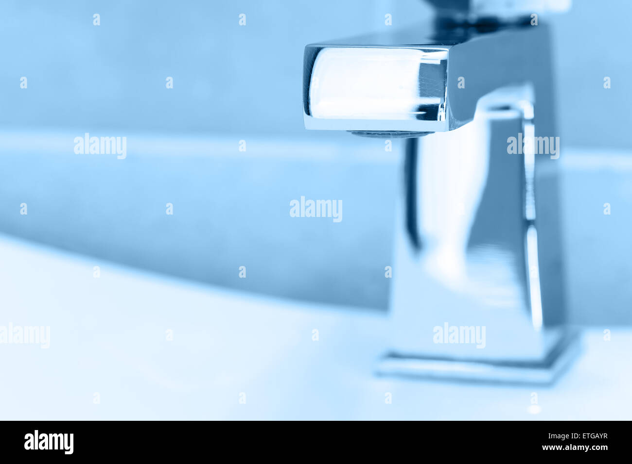 Faucet in bathroom, closeup Stock Photo - Alamy