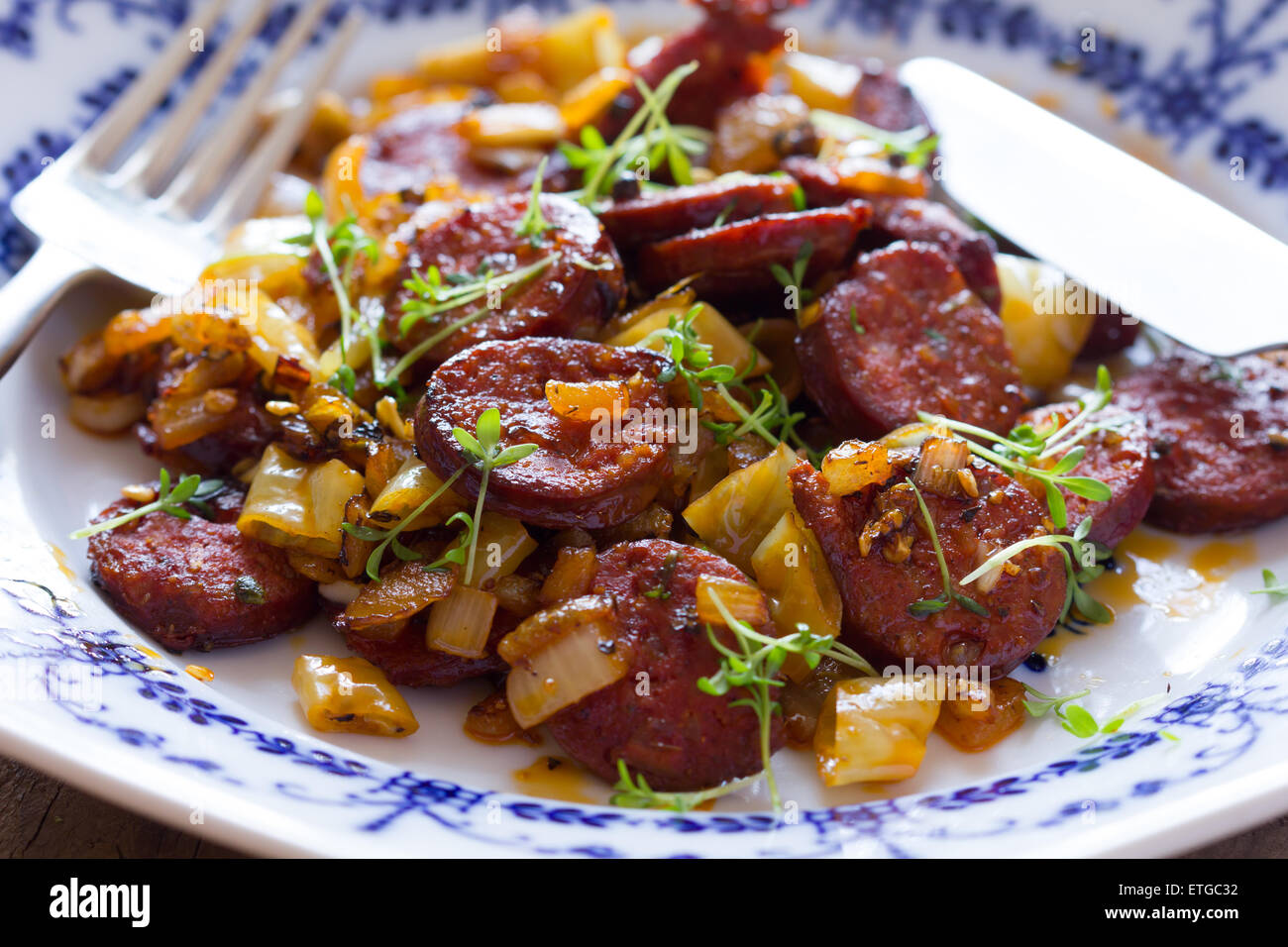 Traditional sausage with onion Stock Photo - Alamy