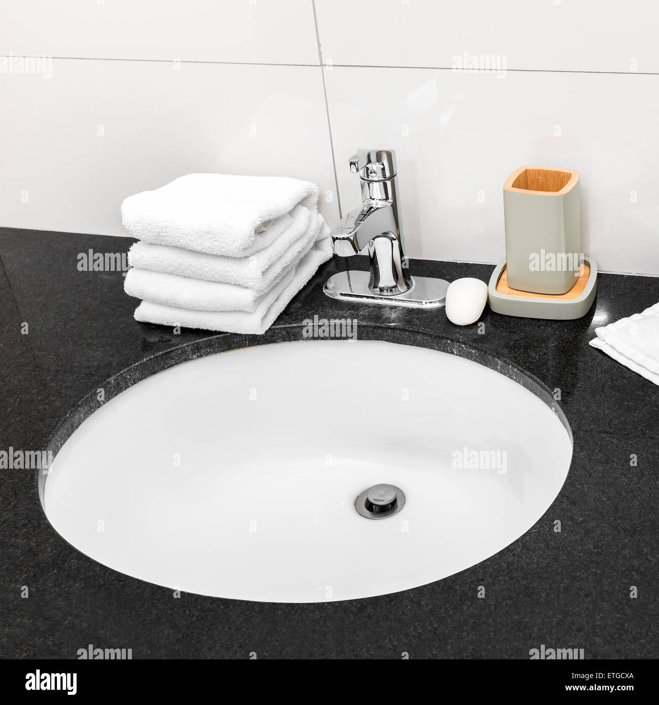 Bathroom sink at restroom hotel interior Stock Photo - Alamy