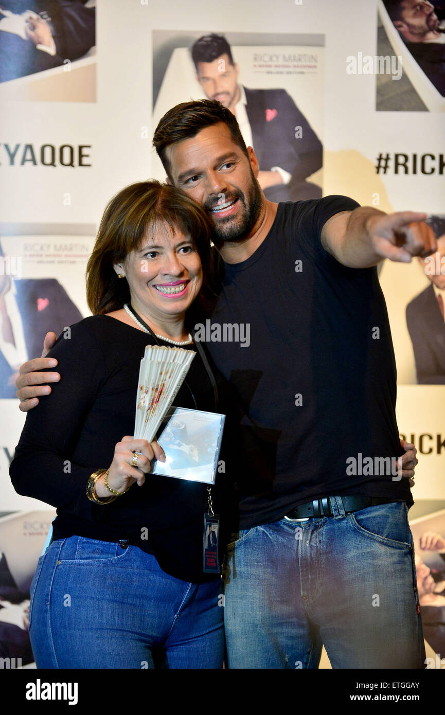 Ricky Martin meets and greets fans at BrandsMart USA signing his new CD ...