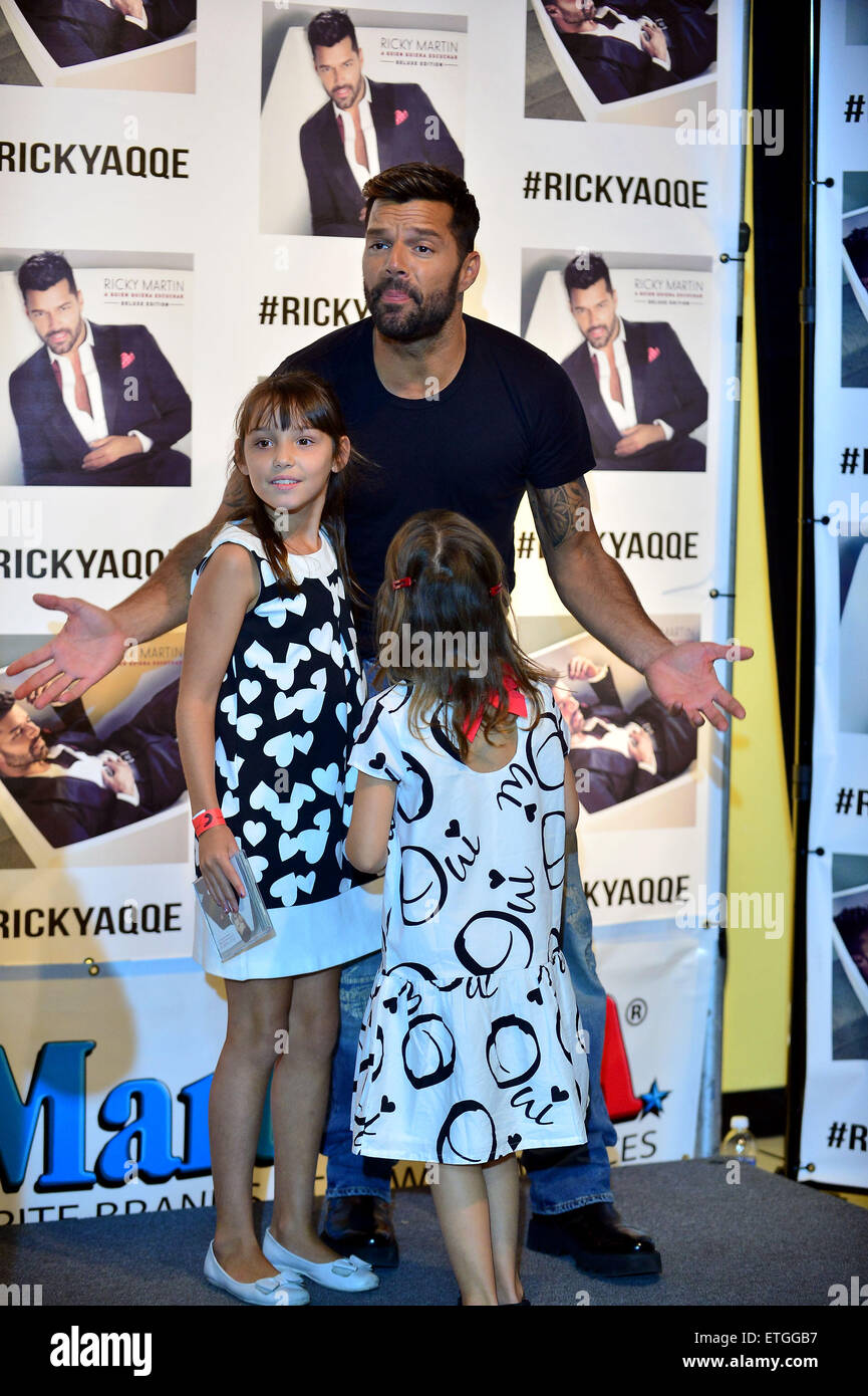 Ricky Martin meets and greets fans at BrandsMart USA signing his new CD ...
