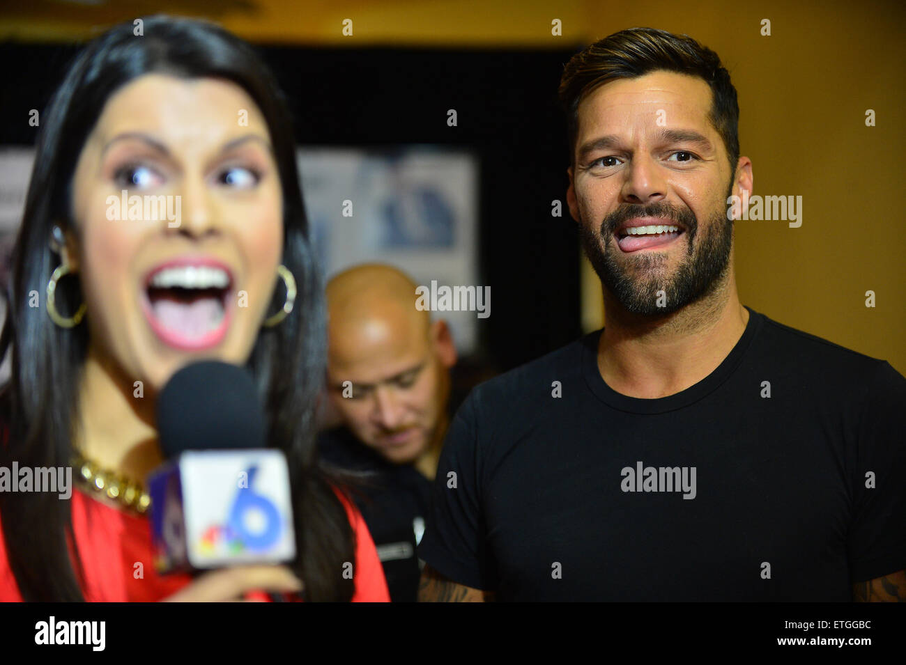 Ricky Martin meets and greets fans at BrandsMart USA signing his new CD ...