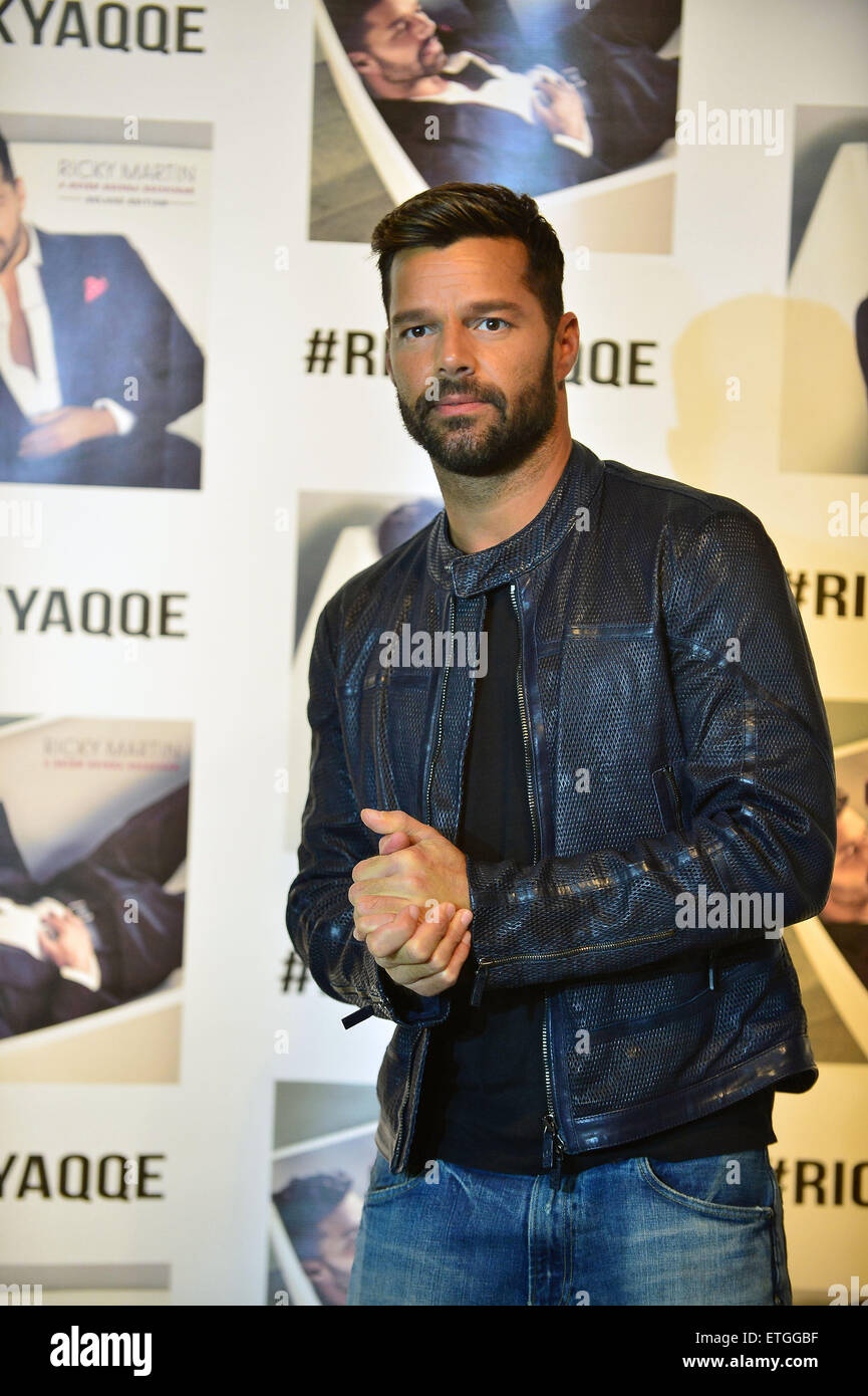 Ricky Martin meets and greets fans at BrandsMart USA signing his new CD ...