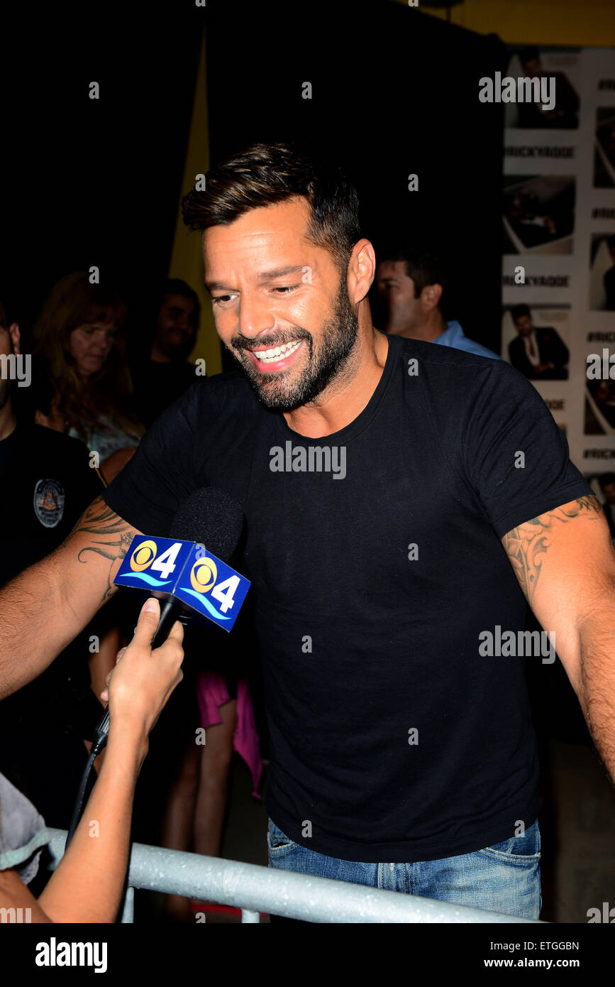 Ricky Martin meets and greets fans at BrandsMart USA signing his new CD ...