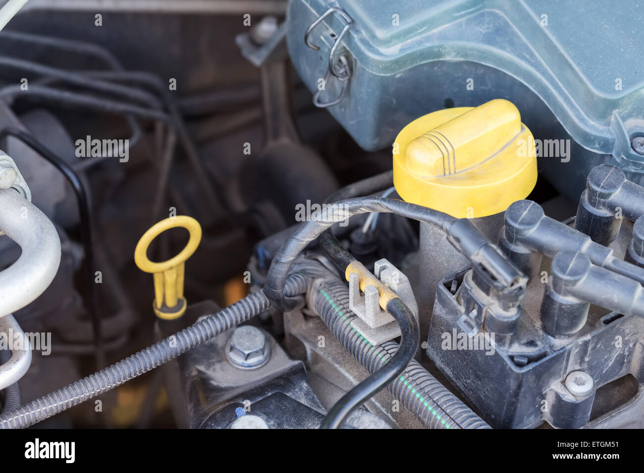 Closeup parts of car engine. Checking oil Stock Photo - Alamy