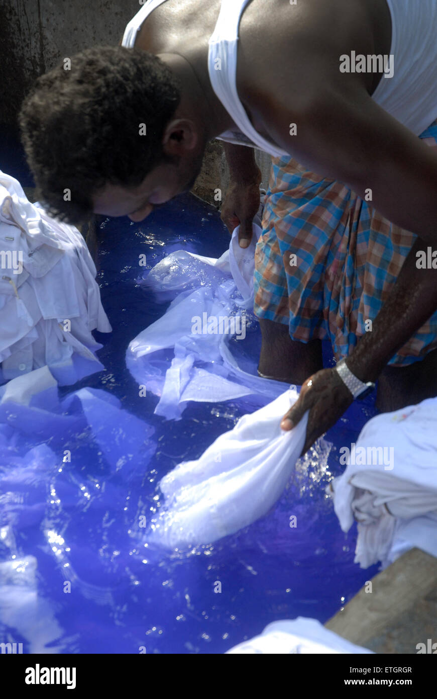 Men washing clothes at Mahalaxmi Dhobi Ghat open air laundromat, Mumbai ...