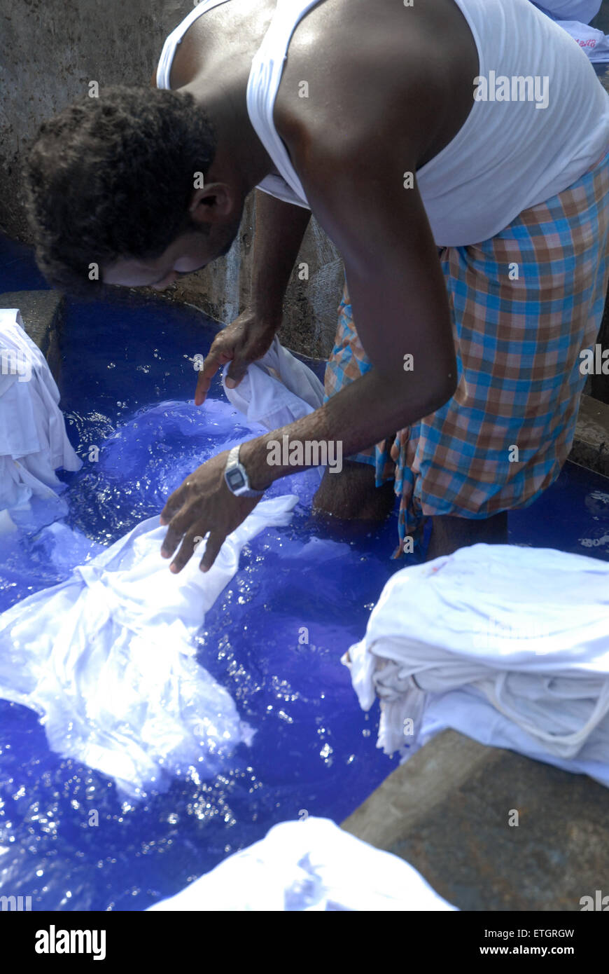 Men washing clothes at Mahalaxmi Dhobi Ghat open air laundromat, Mumbai ...