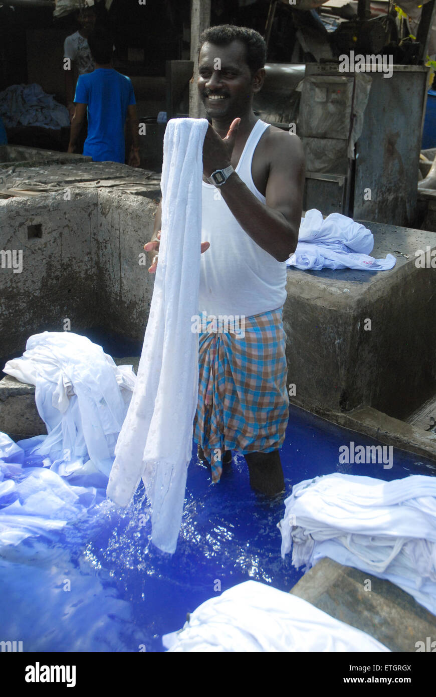 Men washing clothes at Mahalaxmi Dhobi Ghat open air laundromat, Mumbai ...