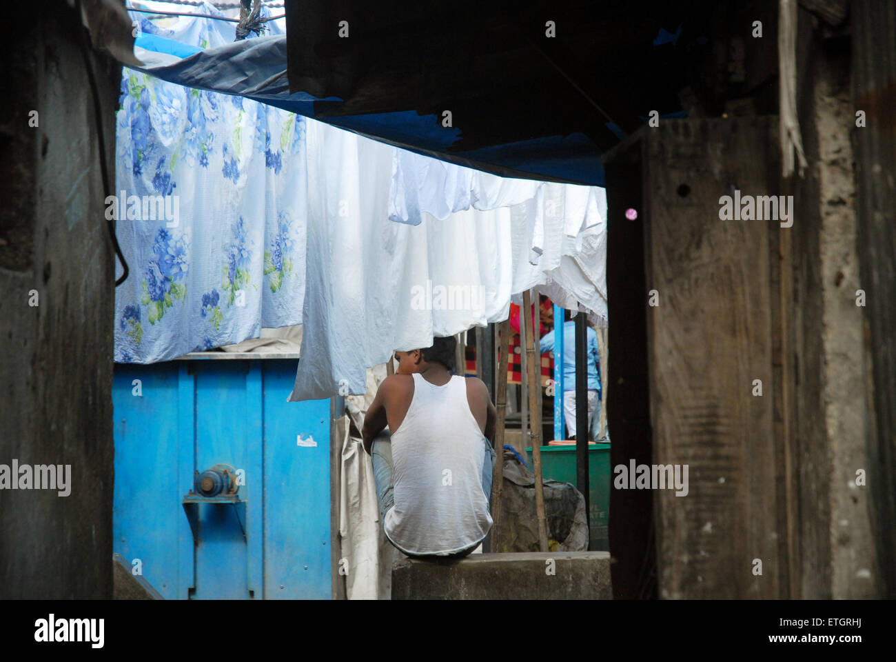 Men washing clothes at Mahalaxmi Dhobi Ghat open air laundromat, Mumbai ...